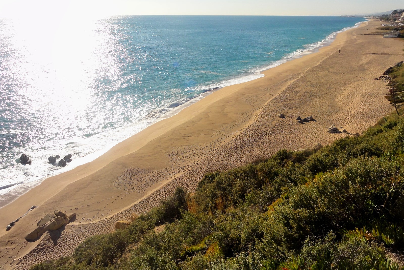 Platja De Les Roques D'en Lluc in Barcelona - A Sandy Sanctuary - Go Guides